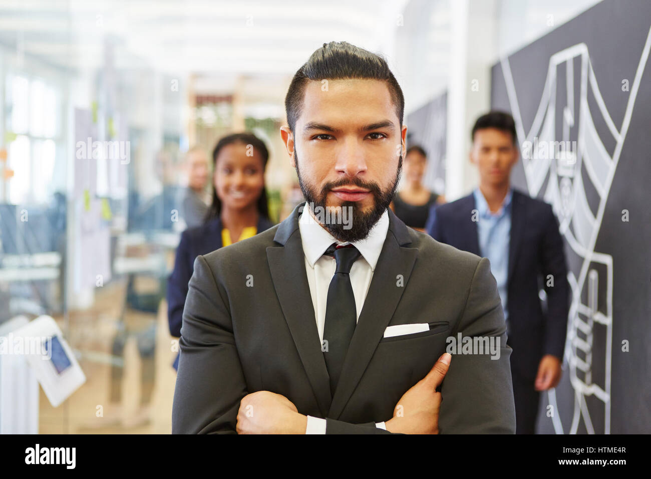 Man as manager or consultant showing leadership Stock Photo - Alamy