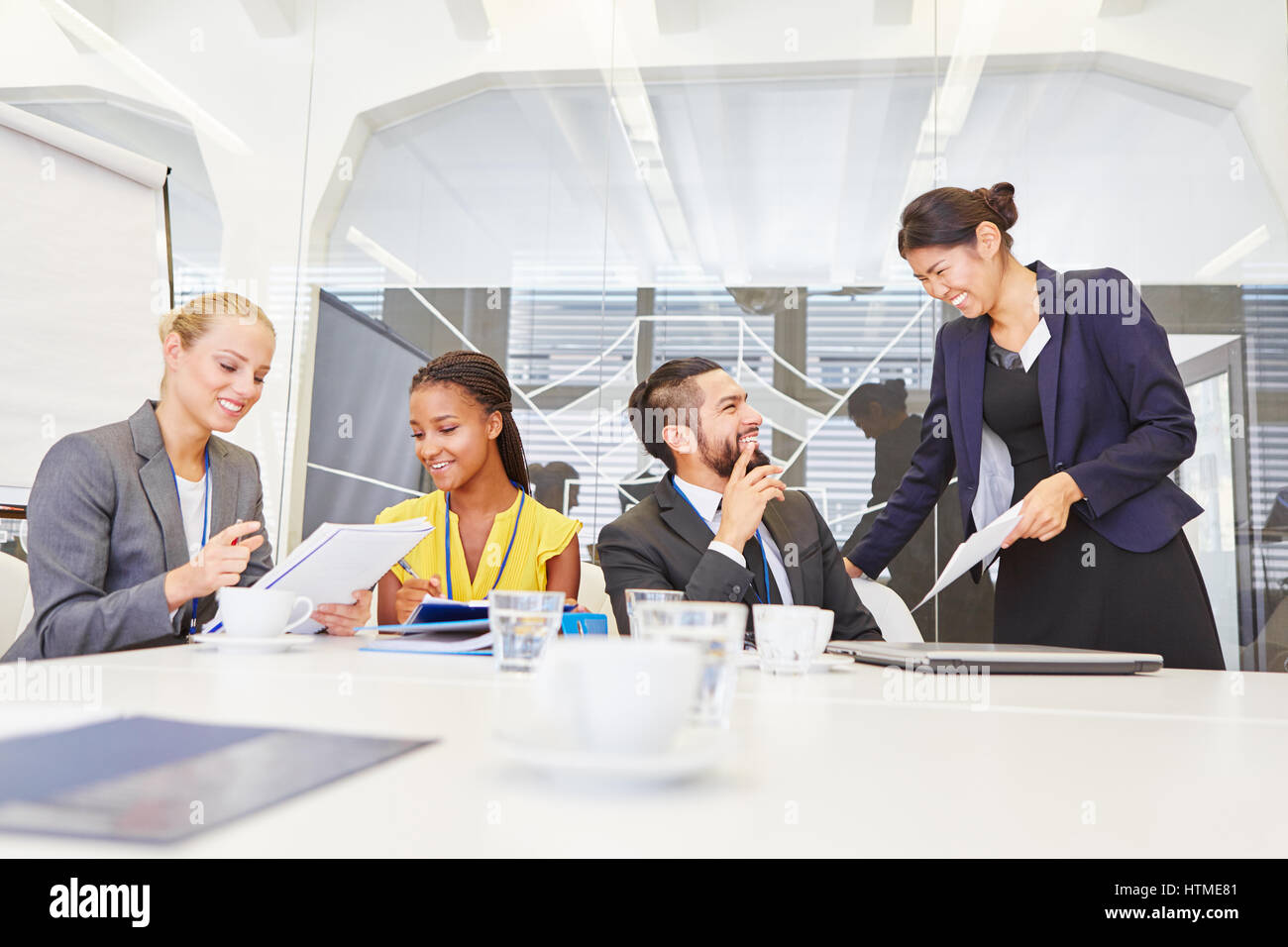 Group of business people working during business meeting in cooperation ...