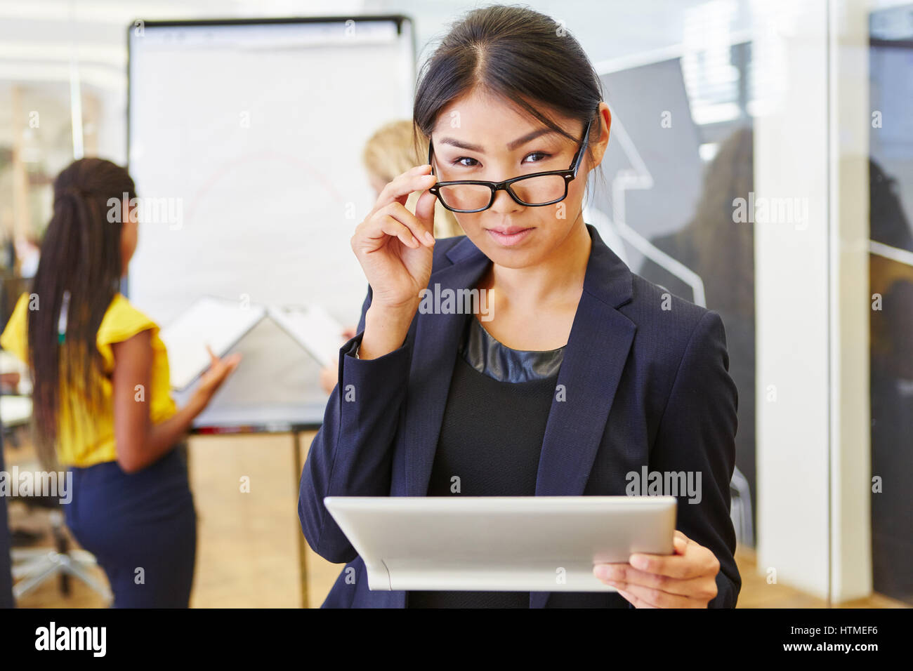 Asian woman as manager with competence planning strategy with ...