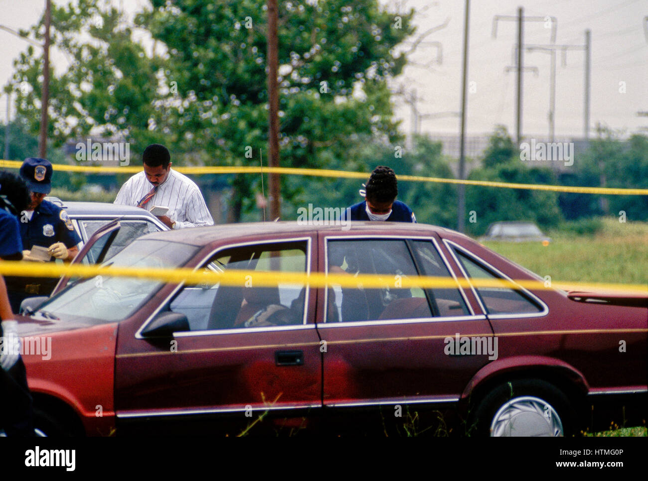Neighbors watch crime scene hi-res stock photography and images - Alamy