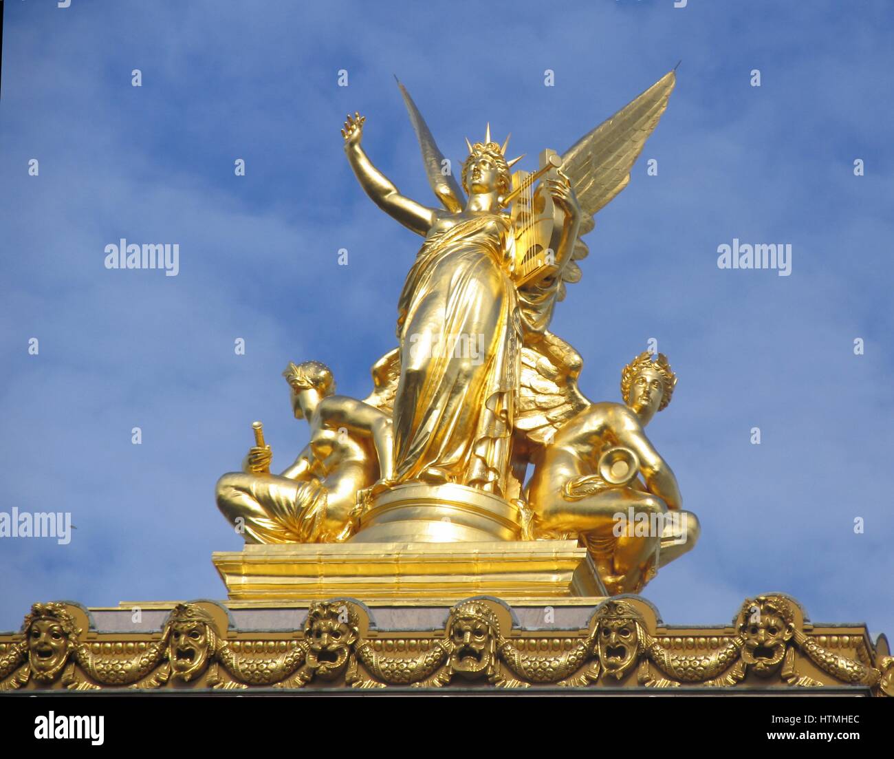 Gilded figure on the top front facade of the Opera Garnier, (Paris ...