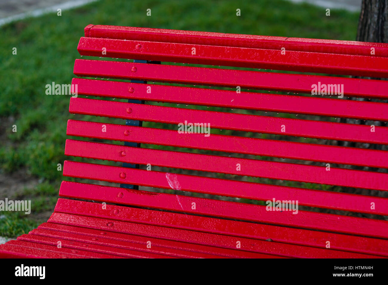 Red park bench Stock Photo - Alamy