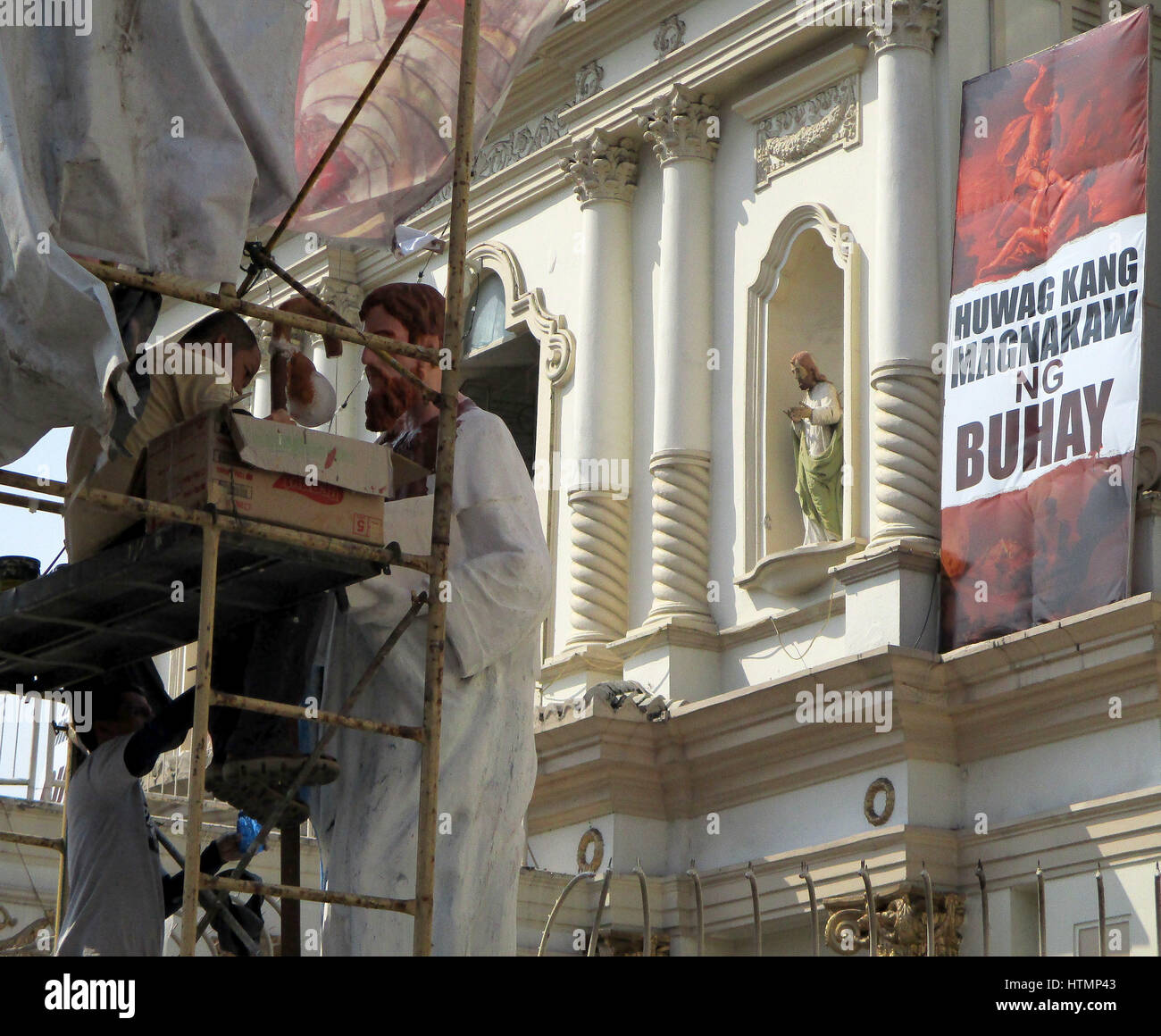 Philippines. 13th Mar, 2017. Workers apply paint on a statue at the ...