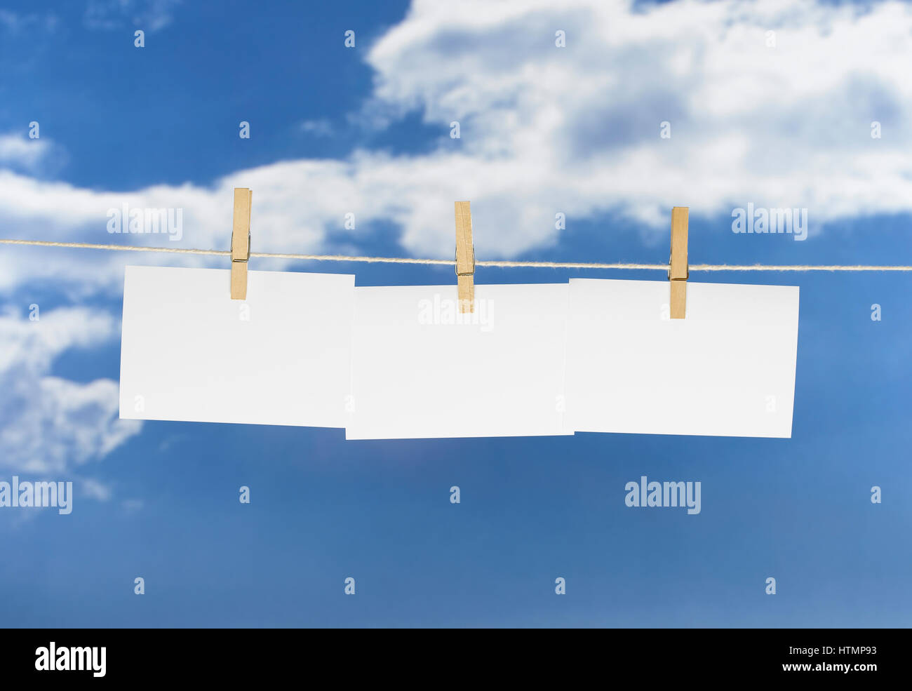Washing Line with hanging blank paper Stock Photo - Alamy