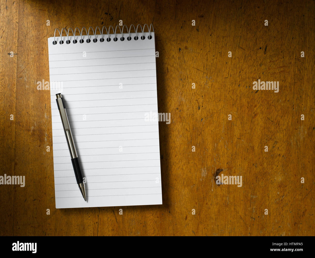 Vintage table top with blank paper Stock Photo - Alamy