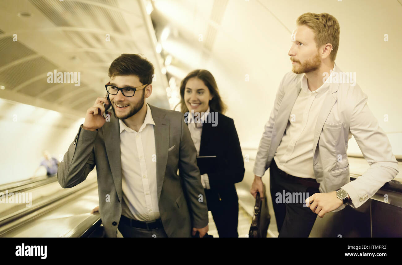 Business colleagues rush to catch subway after work Stock Photo - Alamy