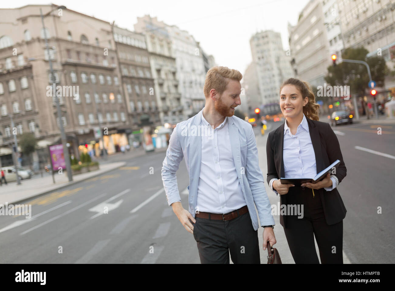 Smiling busy lady in the city hi-res stock photography and images - Alamy