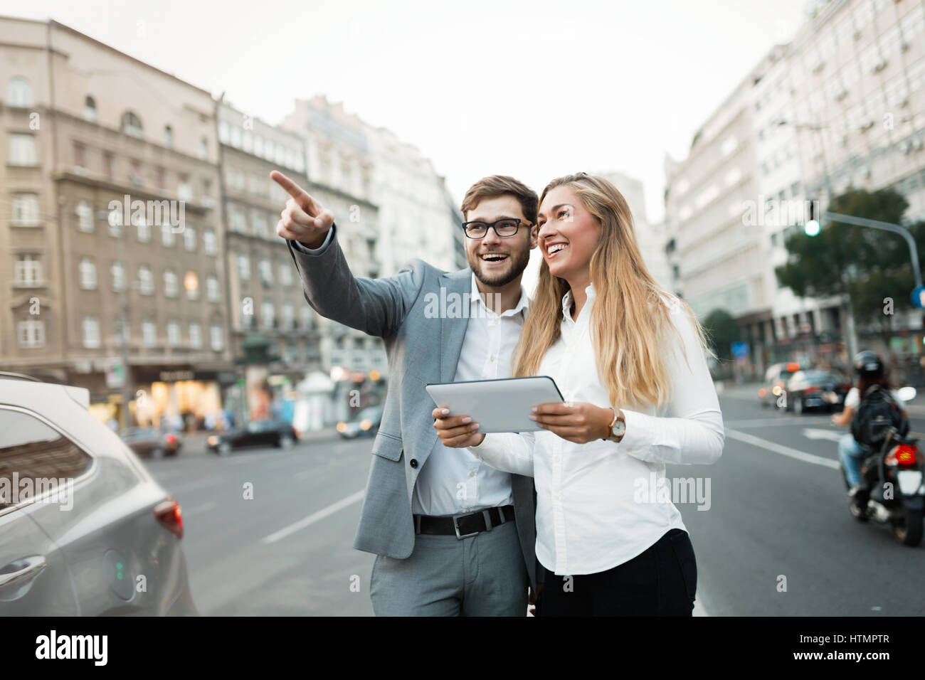 Smiling busy lady in the city hi-res stock photography and images - Alamy