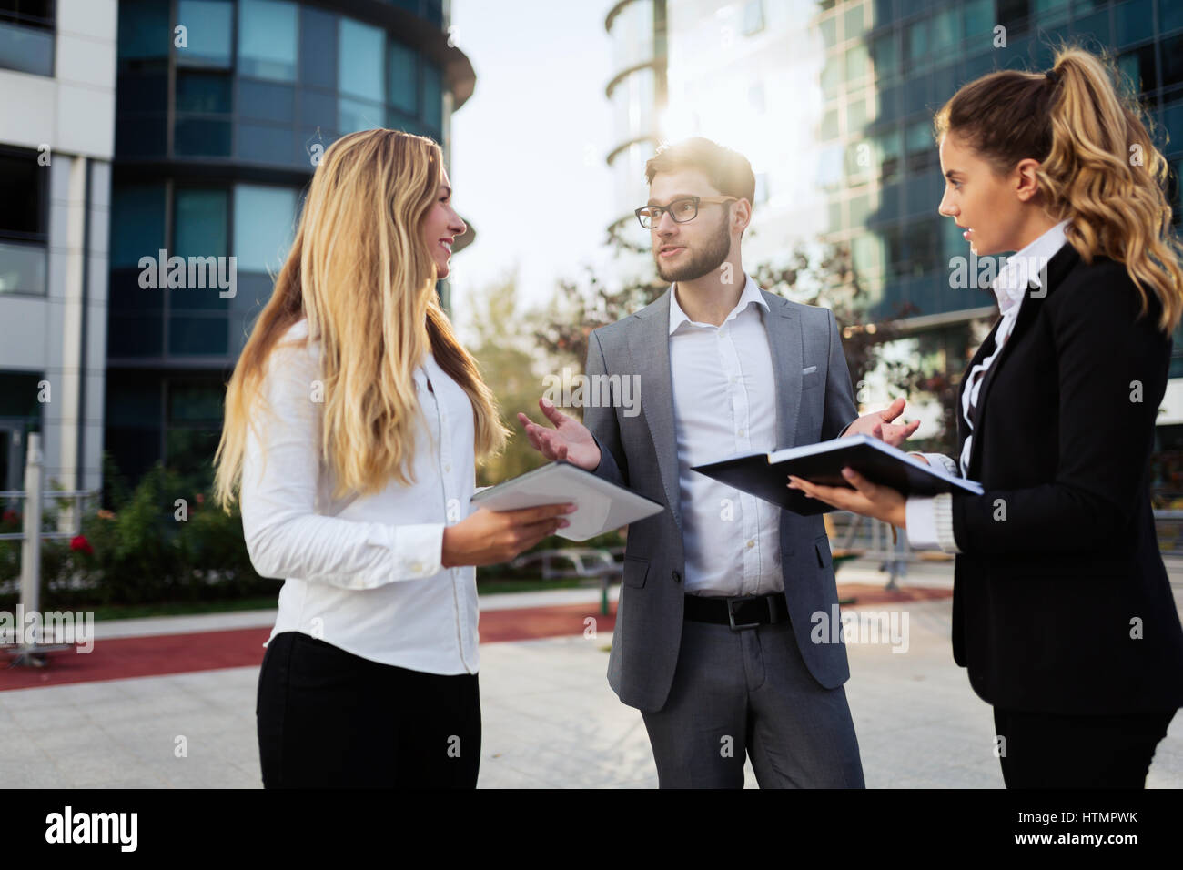 Overworked stressful businessperson too busy at work Stock Photo - Alamy
