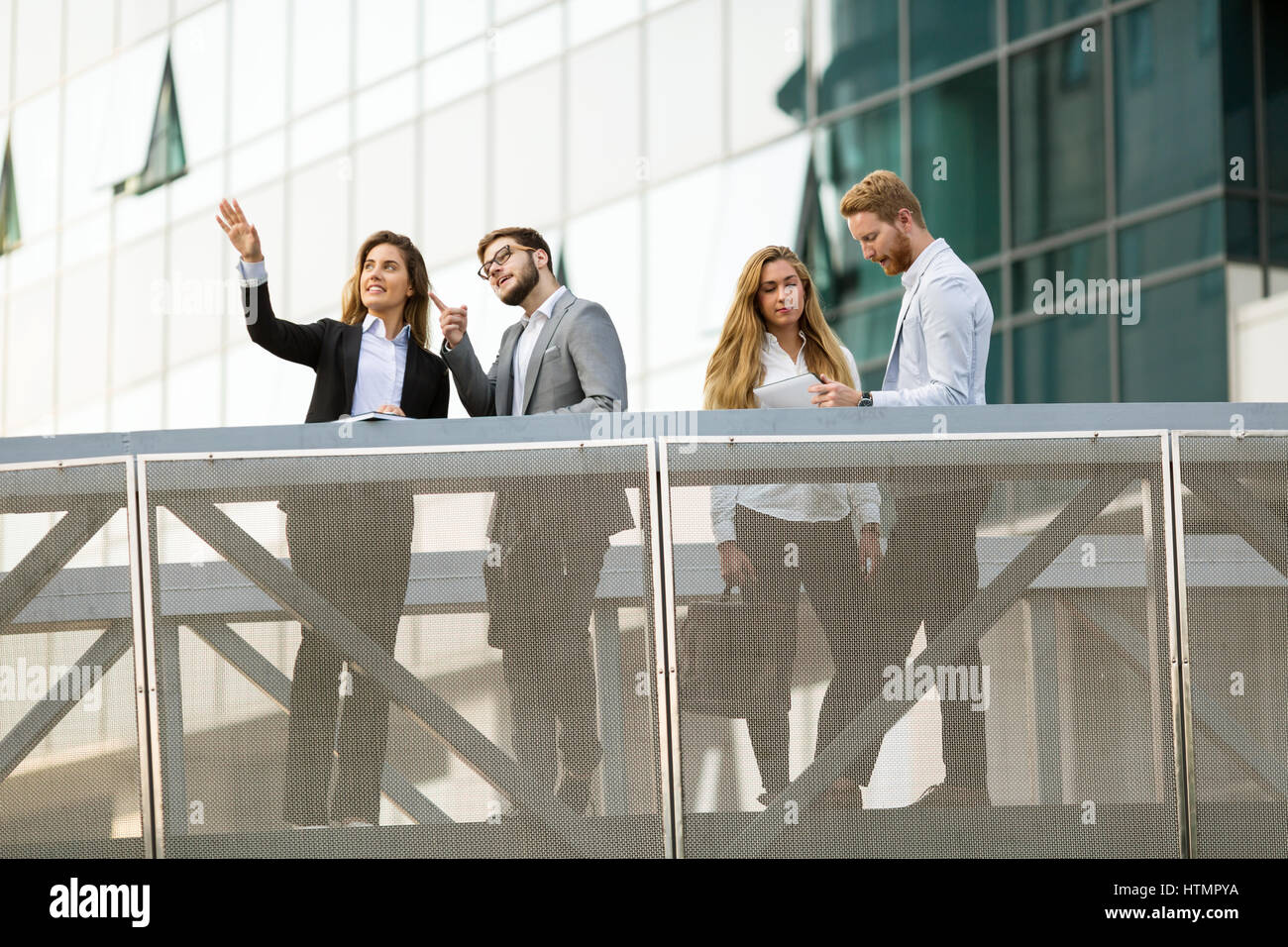 Professional business people and colleagues talking outdoors Stock ...