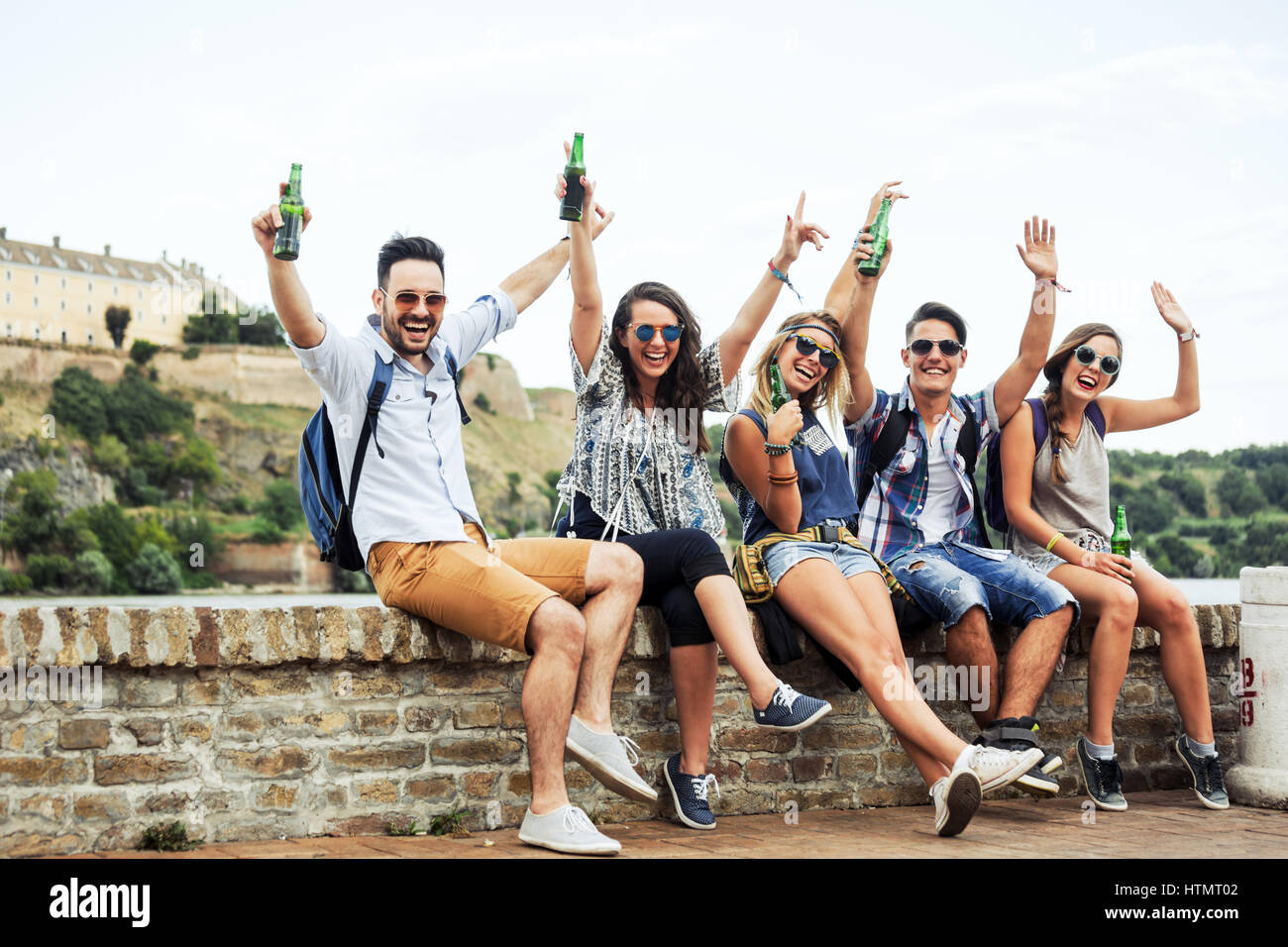 Friends enjoying summer festivals outdoor and drinking Stock Photo - Alamy