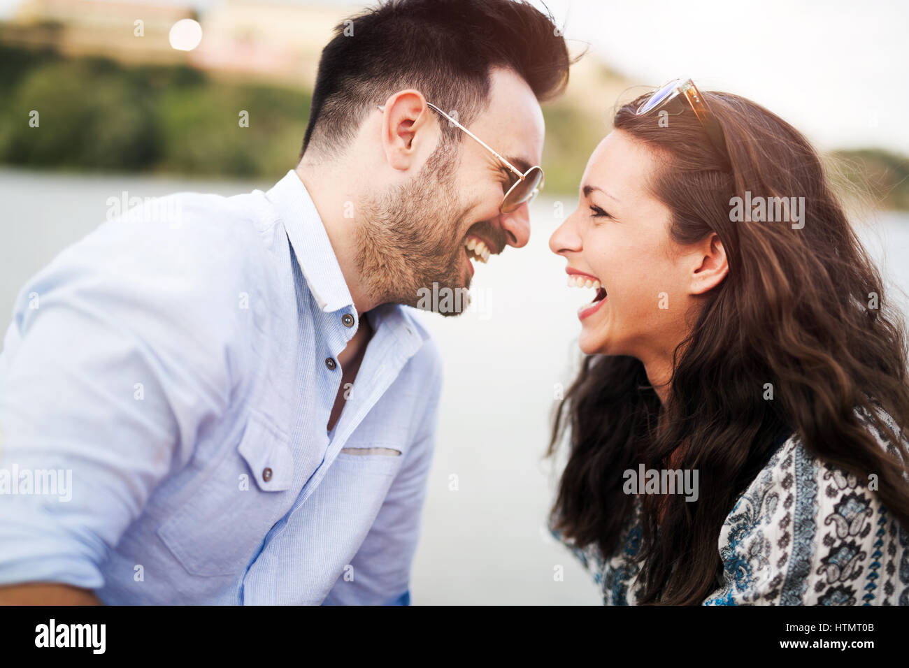 Couple happily embracing outdoors hi-res stock photography and images ...