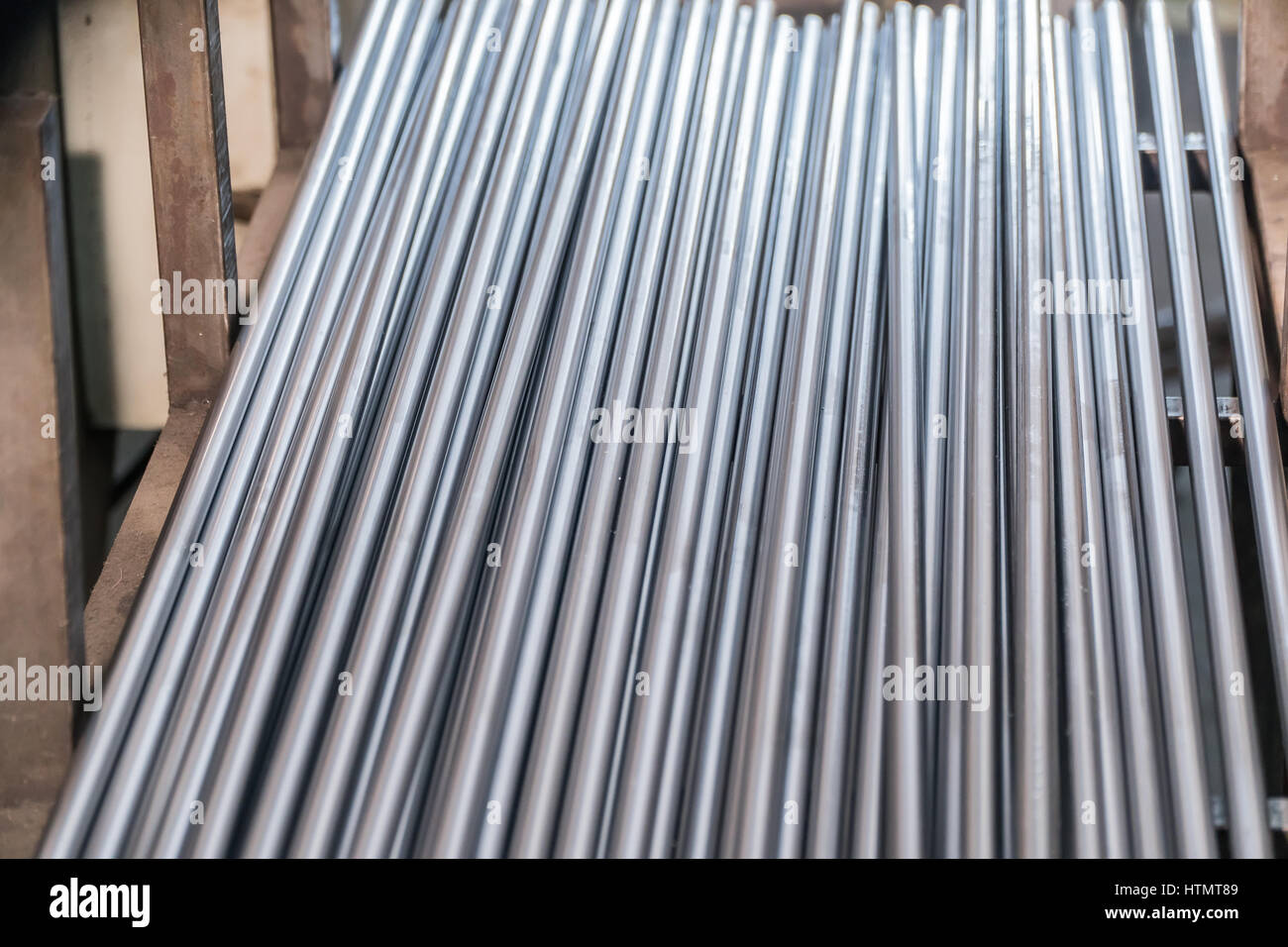 A metallic pipe striped background Stock Photo - Alamy