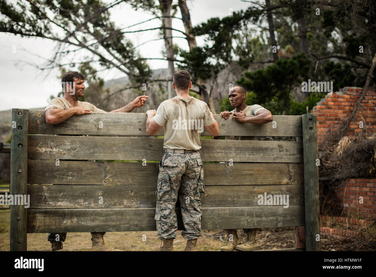 Soldiers climbing wooden wall in hi-res stock photography and images ...