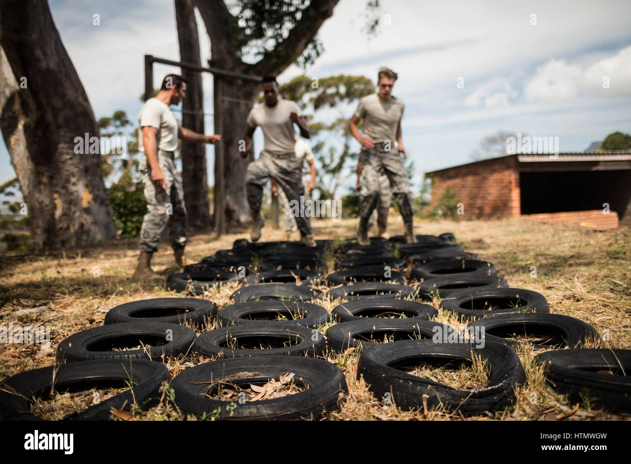 Trainer giving training to military soldiers at boot camp Stock Photo ...