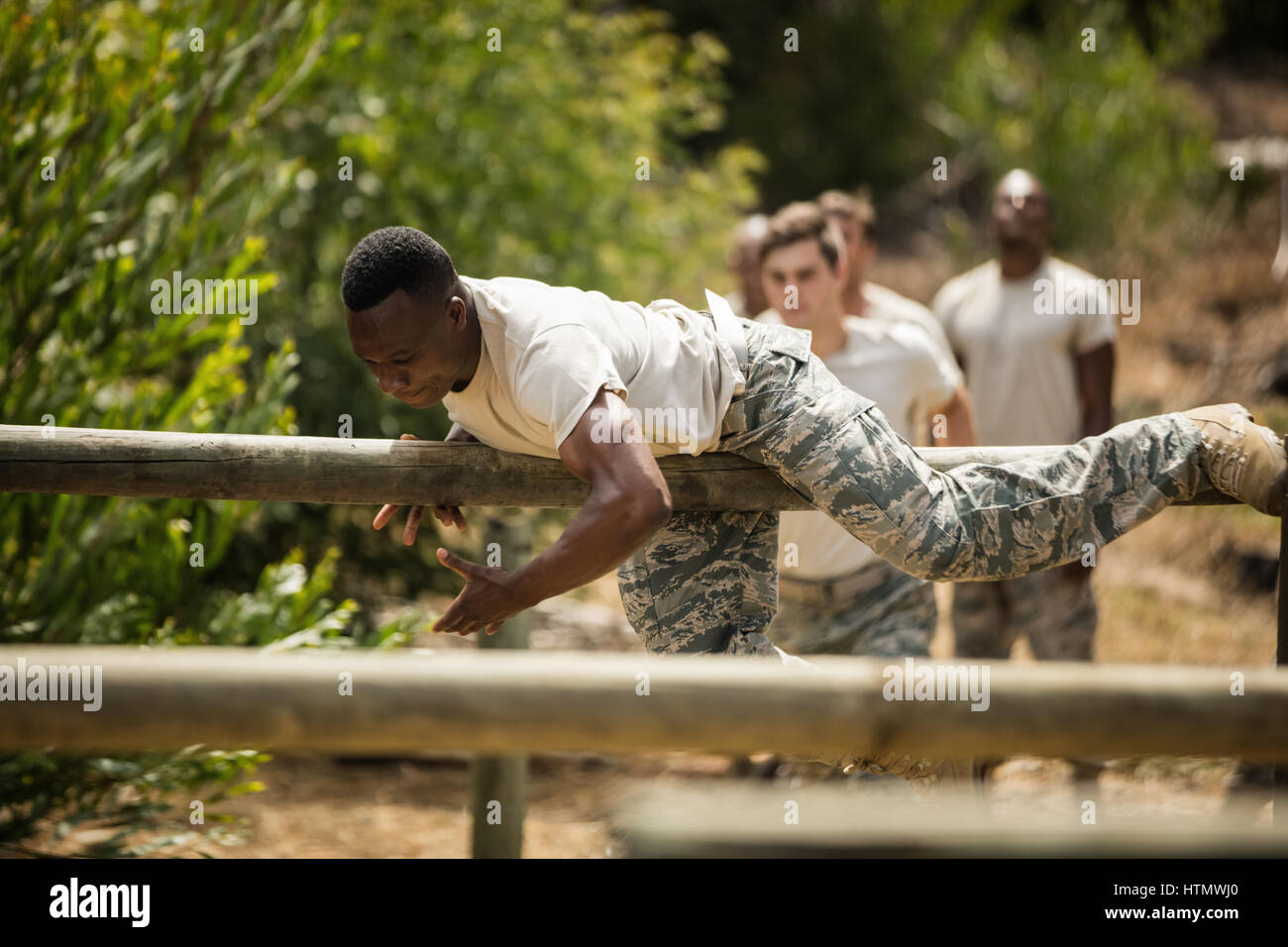 Military soldiers training on fitness trail at boot camp Stock Photo ...