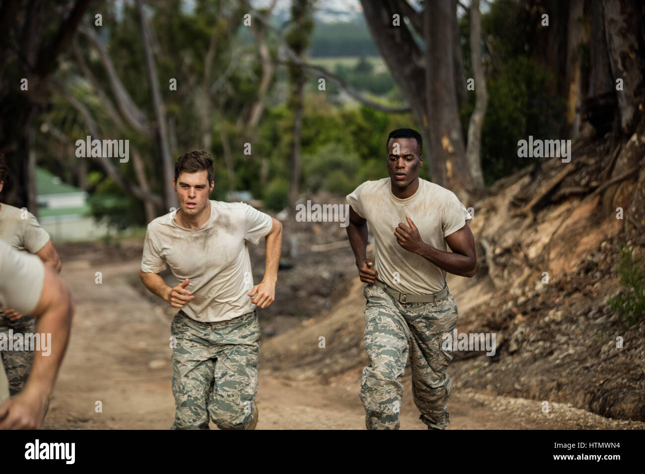 Soldiers running in boot camp Stock Photo - Alamy