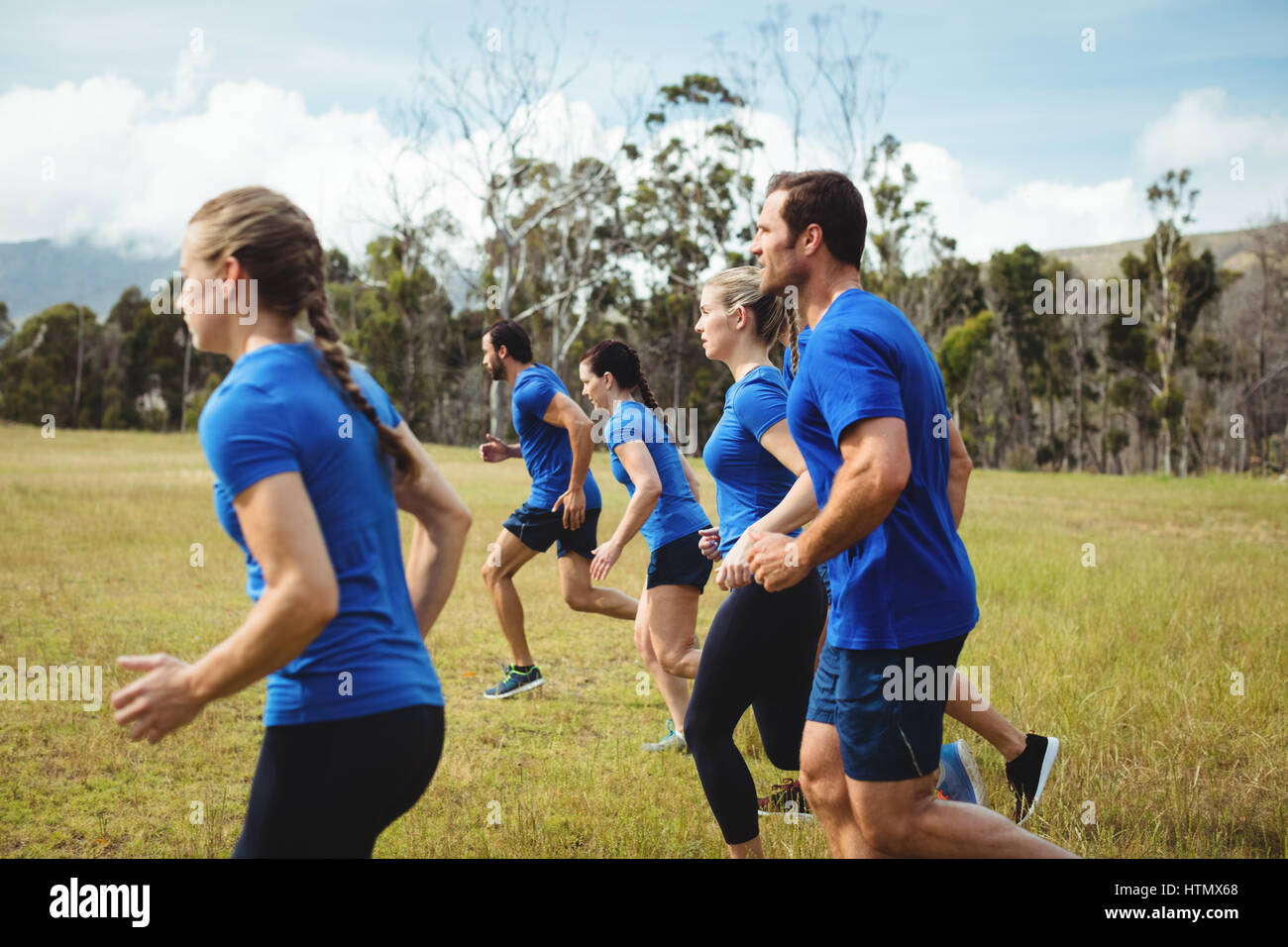 Woman running in boot camp hi-res stock photography and images - Alamy