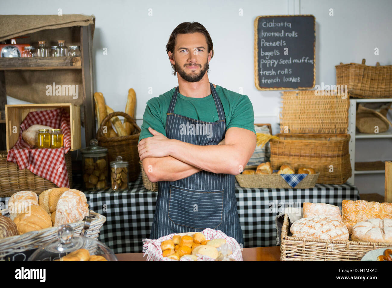 Portrait handsome seller arms crossed hi-res stock photography and ...