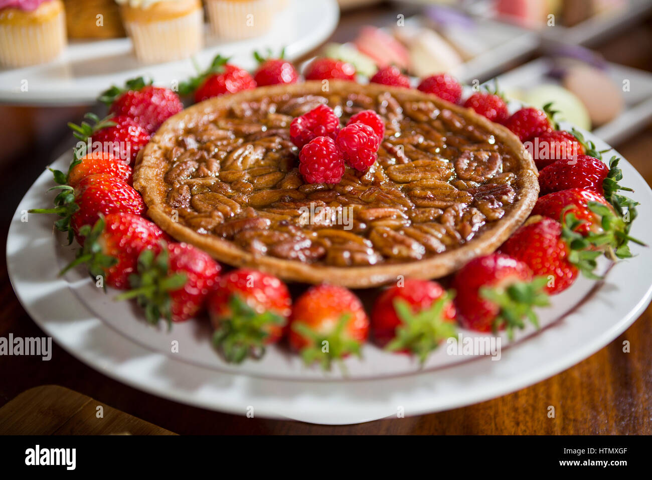 Close-up of strawberry pie at display counter in bakery shop Stock ...