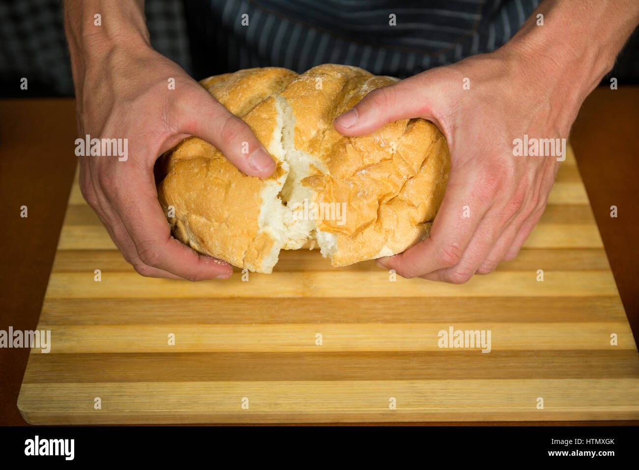 Tearing bread hi-res stock photography and images - Alamy