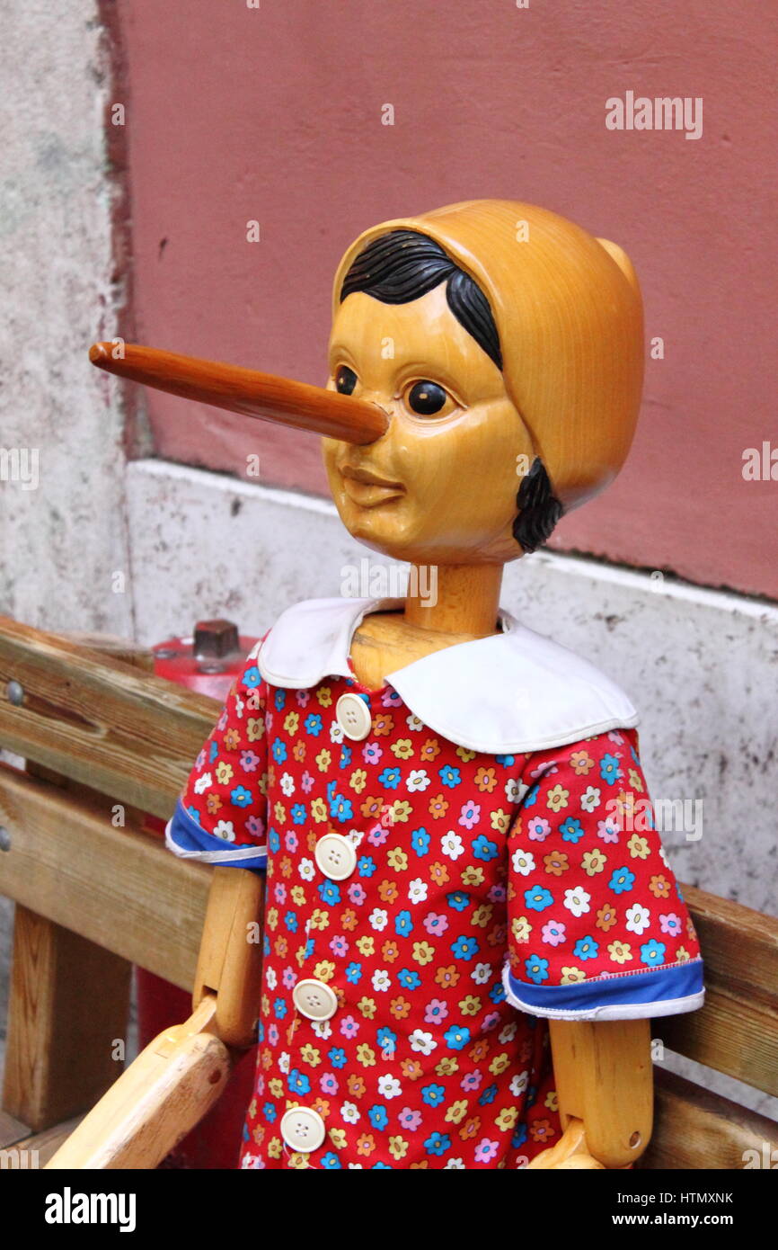 A smiling Pinocchio, the italian wooden puppet Stock Photo - Alamy