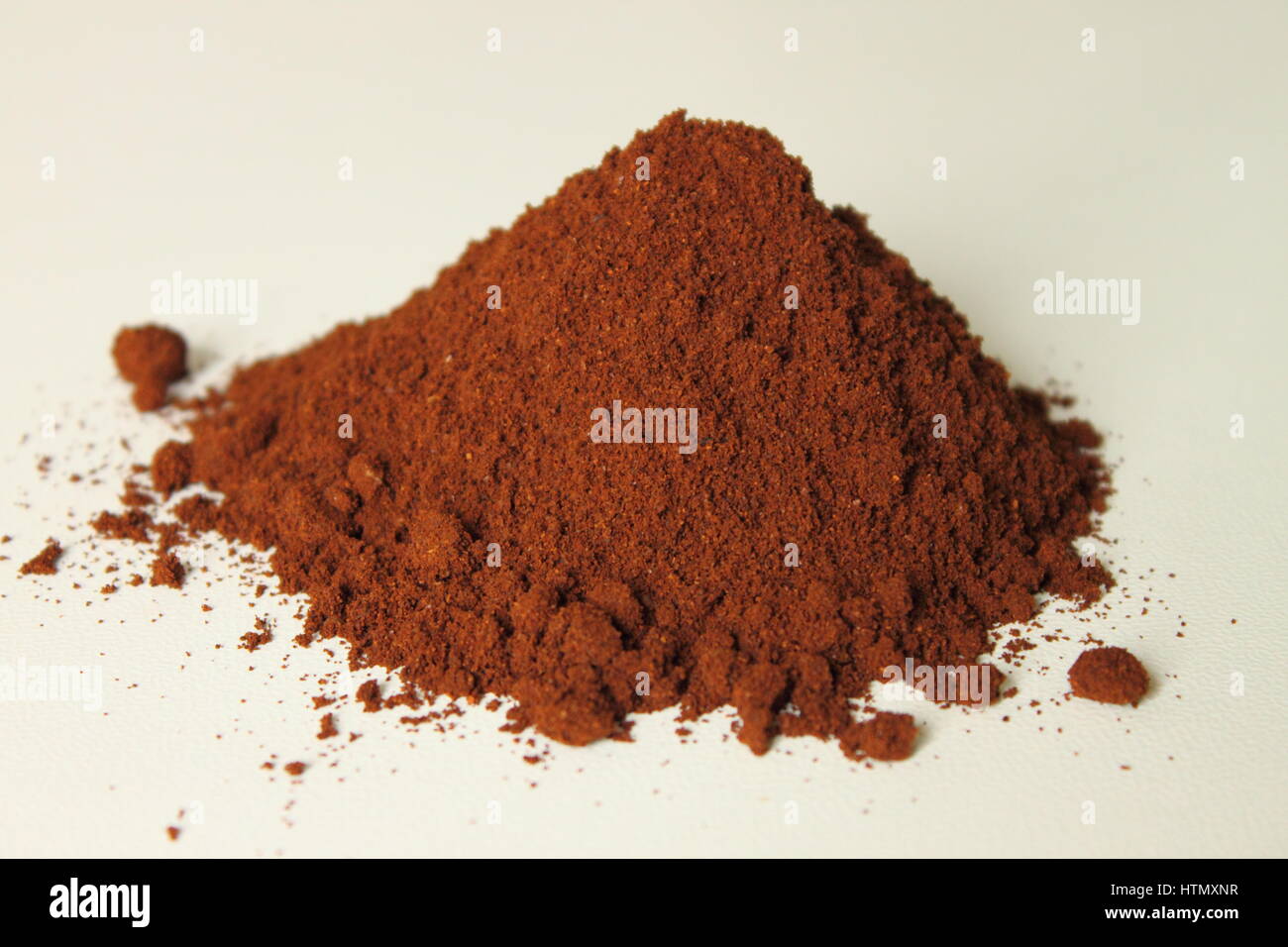 Cocoa powder isolated on a white background Stock Photo - Alamy
