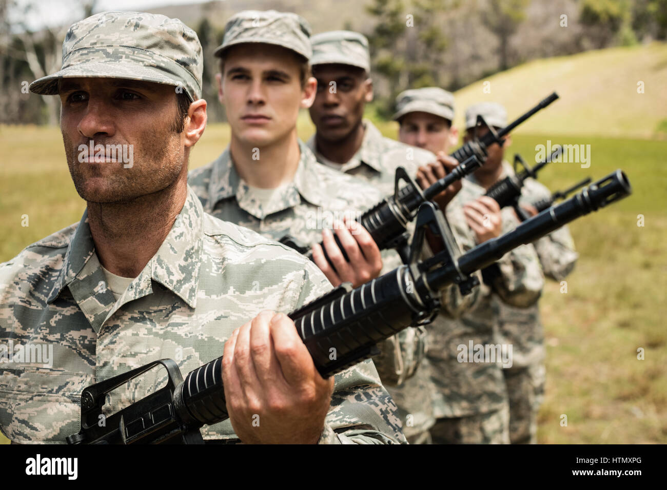 Standing holding weaponry army soldier uniform hi-res stock photography ...