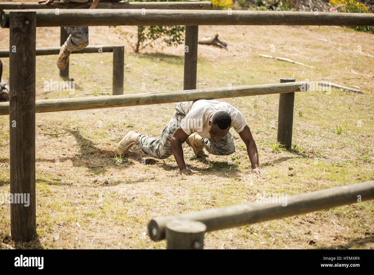 Military soldiers training on fitness trail at boot camp Stock Photo ...
