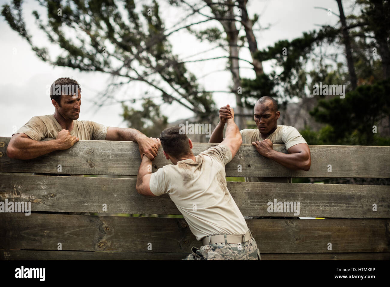 Soldiers climbing wooden wall in hi-res stock photography and images ...