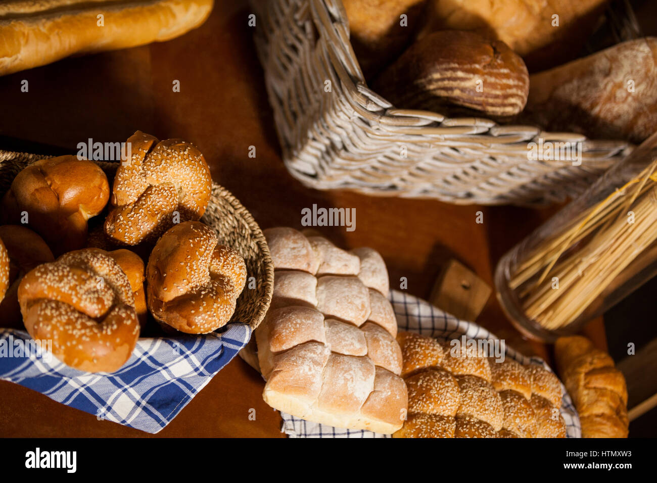 Various sweet foods at counter in supermarket Stock Photo - Alamy