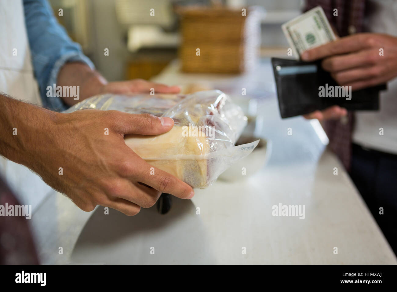 Staff receiving payment from the customer in coffee shop Stock Photo ...