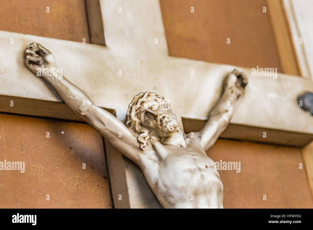 marble Crucifix with suffering Jesus Christ Stock Photo - Alamy