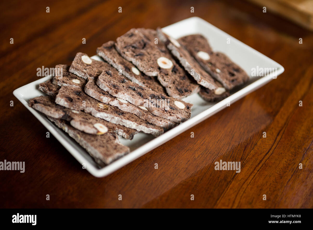 Baked snacks on tray in coffee shop Stock Photo - Alamy