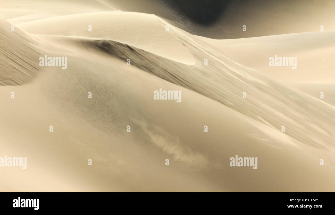 Shifting sand dune contrasts. Desert or beach sand textured background ...