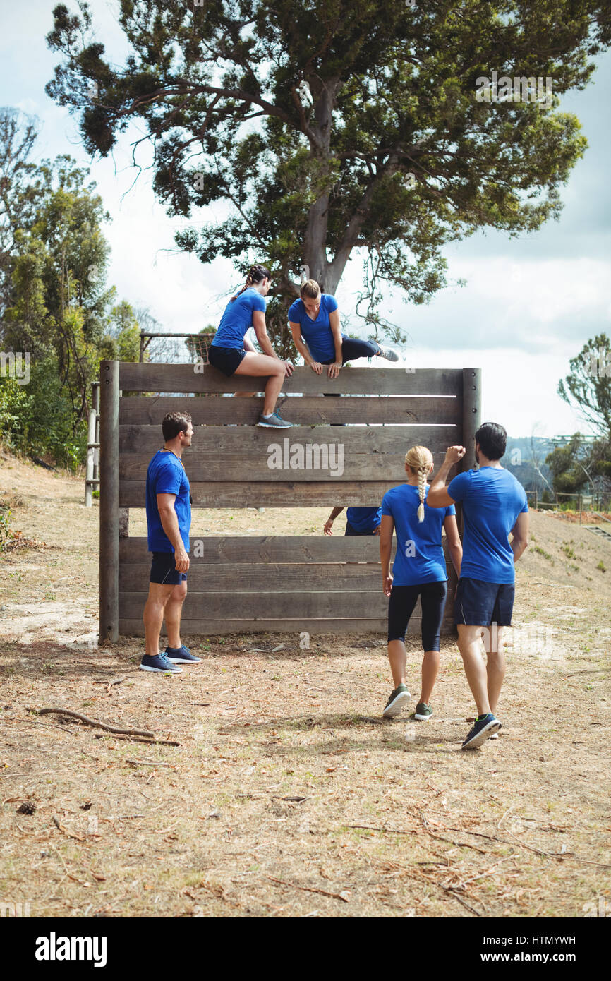 Climb over wall hi-res stock photography and images - Alamy