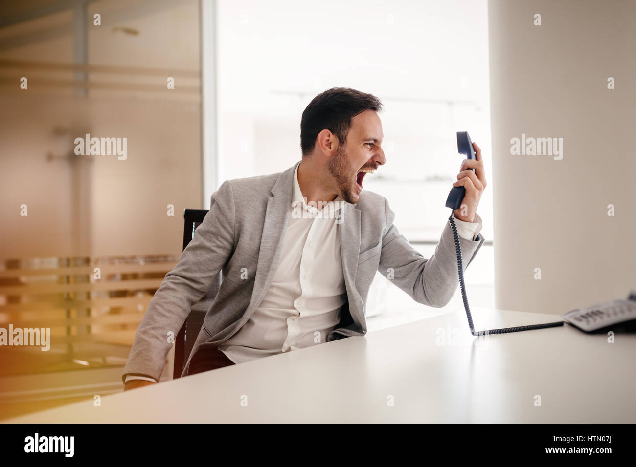 Frustrated office worker phone hi-res stock photography and images - Alamy