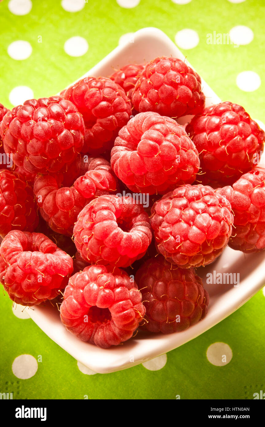 raspberries in a bowl Stock Photo - Alamy