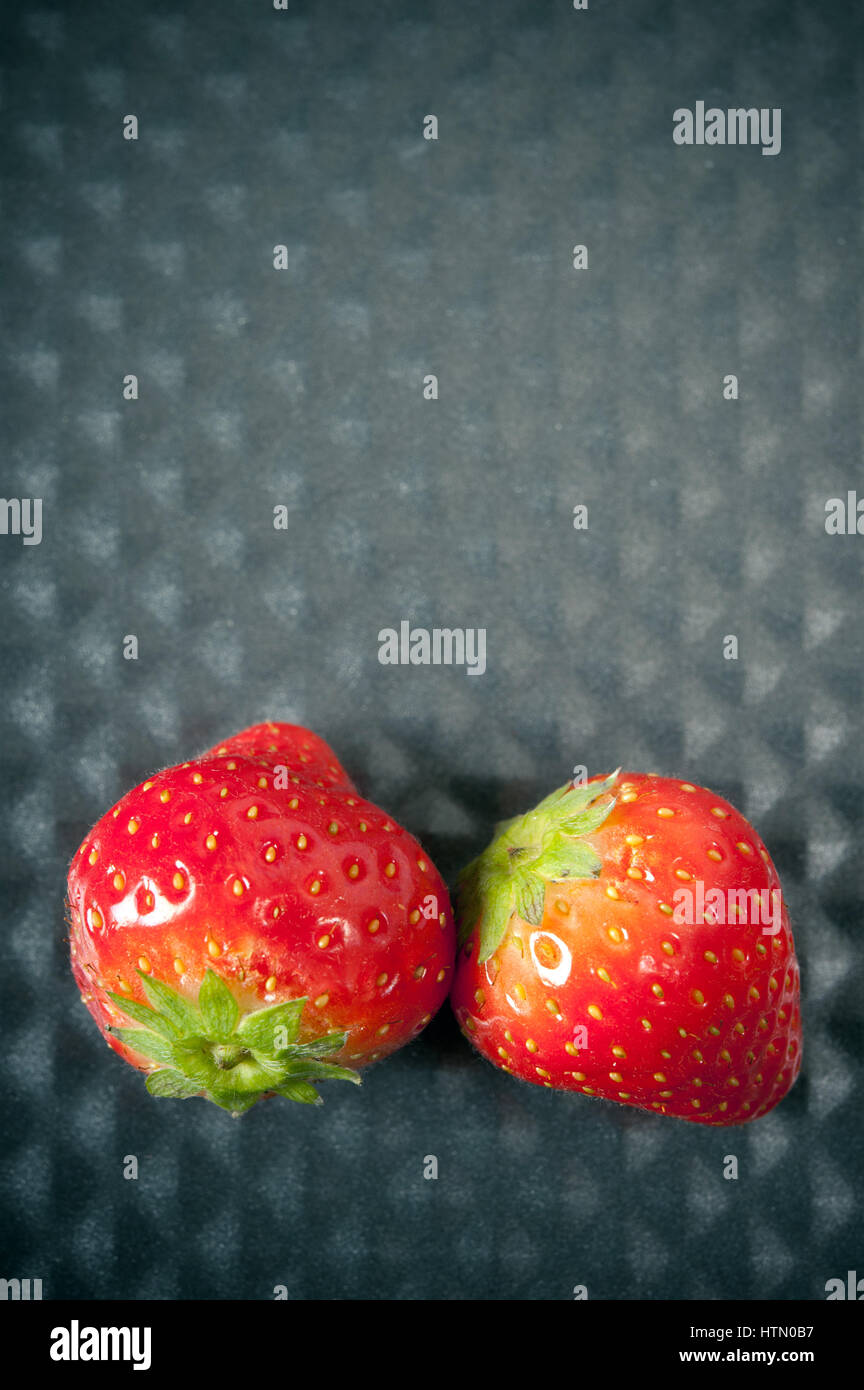 Two strawberries hi-res stock photography and images - Alamy