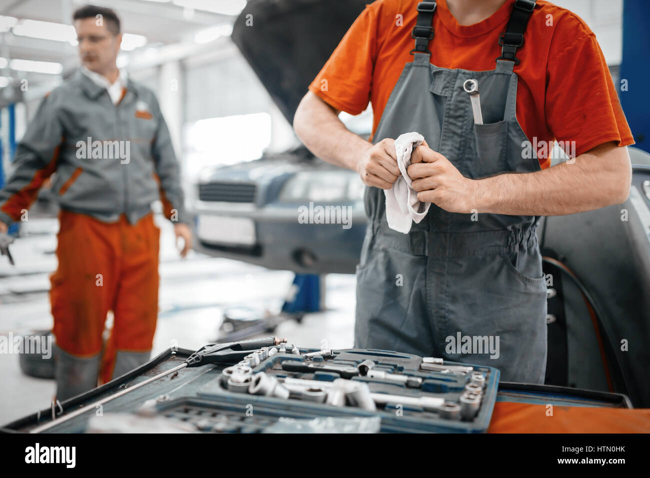 Car mechanic keeping tools hi-res stock photography and images - Alamy