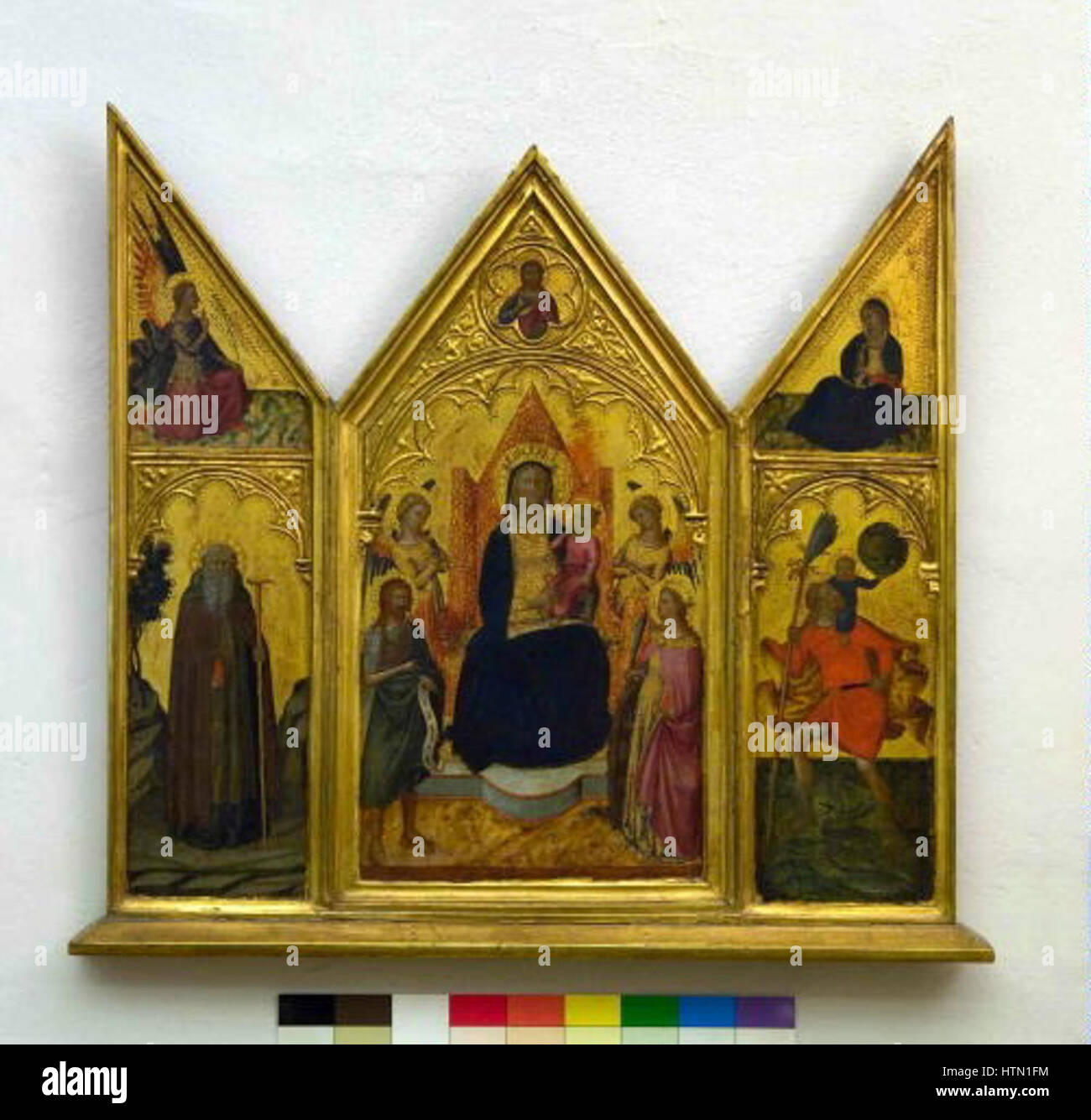 'Triptych by Niccolo Buonaccorso' shows the central panel of a home altar with the Virgin Mary ...