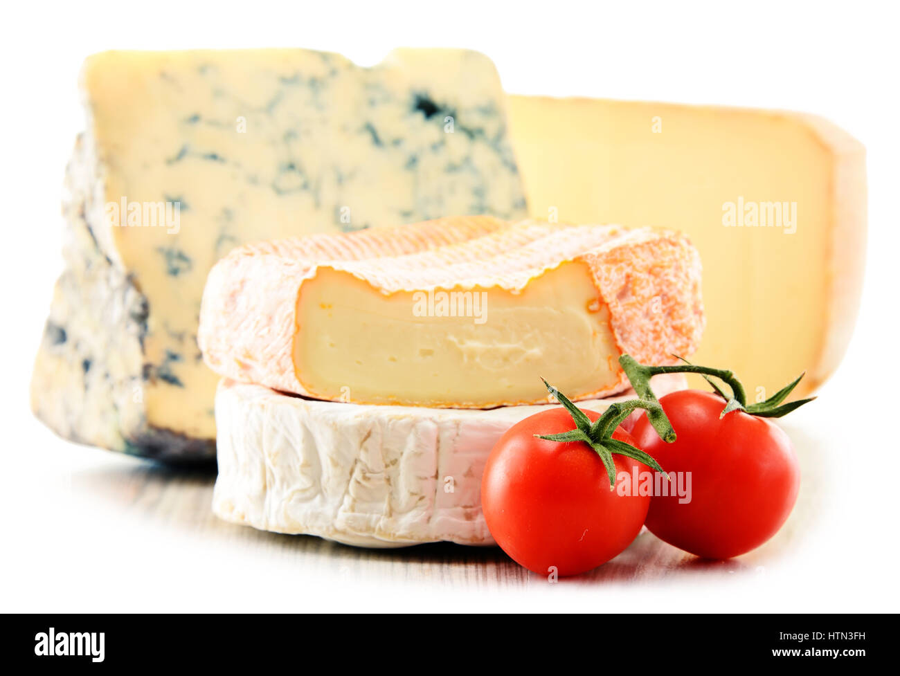Different sorts of cheese isolated on white background Stock Photo - Alamy