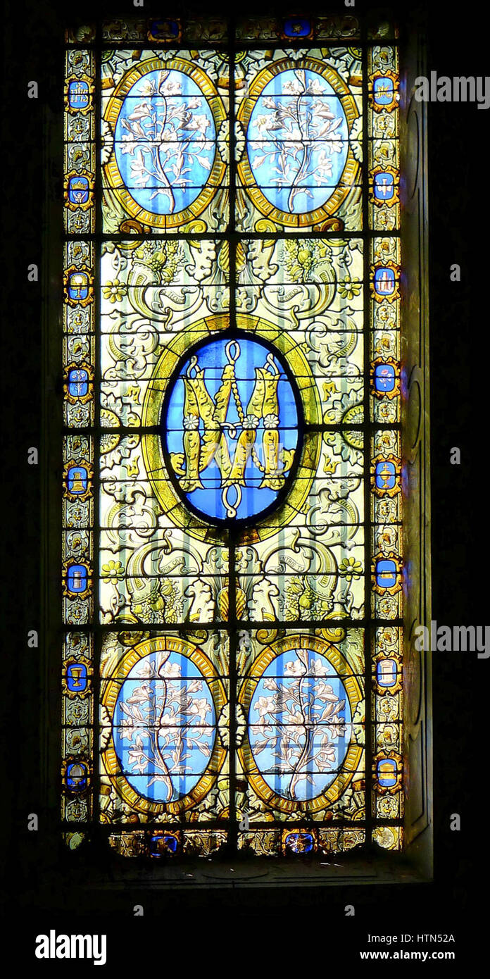 This image captures a stained glass window from the Chapel of the ...