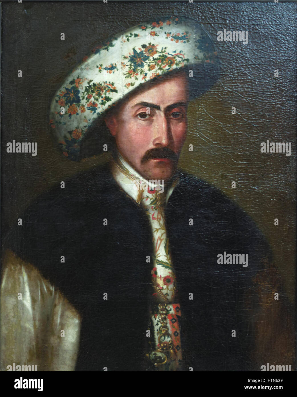 The *Portrait of a Man in Oriental Costume* presents a figure dressed ...