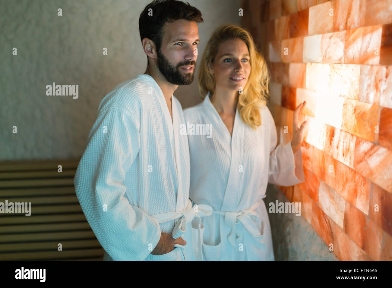Couple enjoying salt room therapy at spa resort Stock Photo - Alamy
