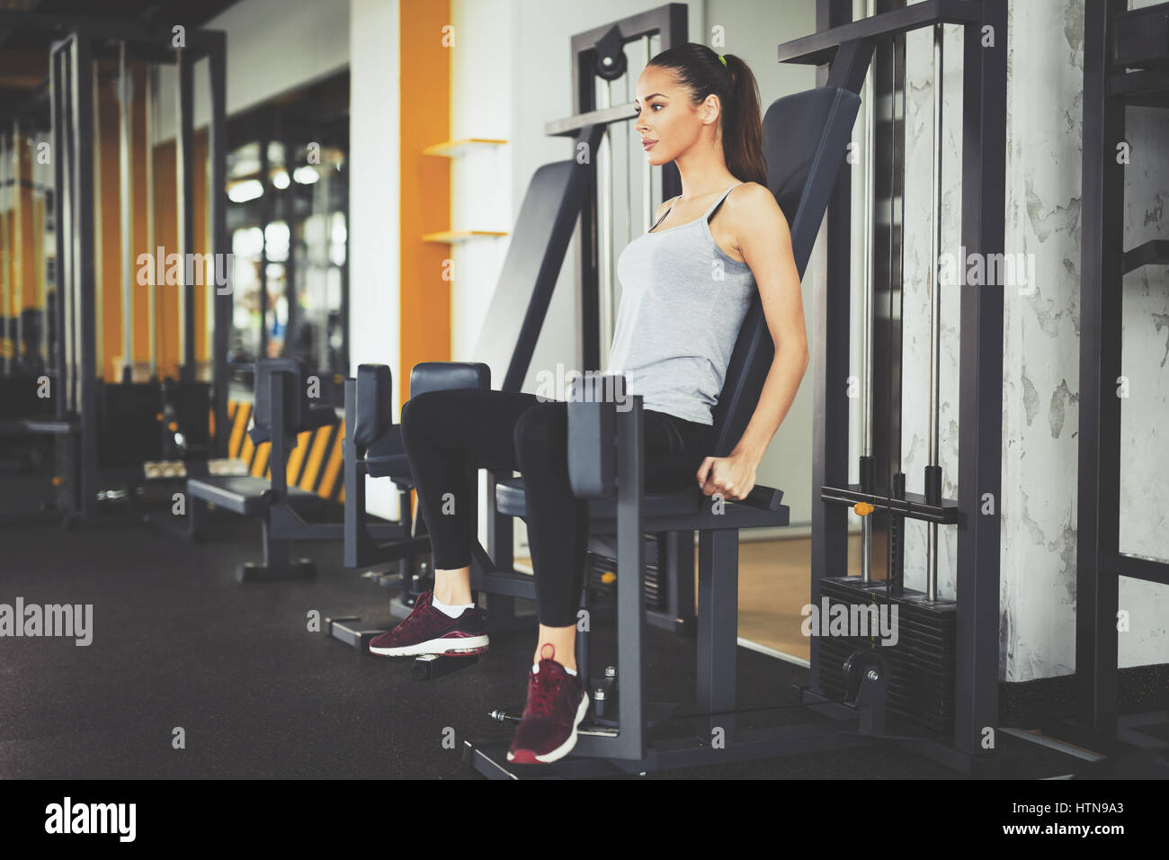 Determined people training and working out in gym Stock Photo - Alamy