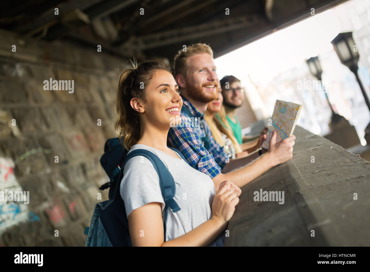 Happy young students on a travelling adventure Stock Photo - Alamy