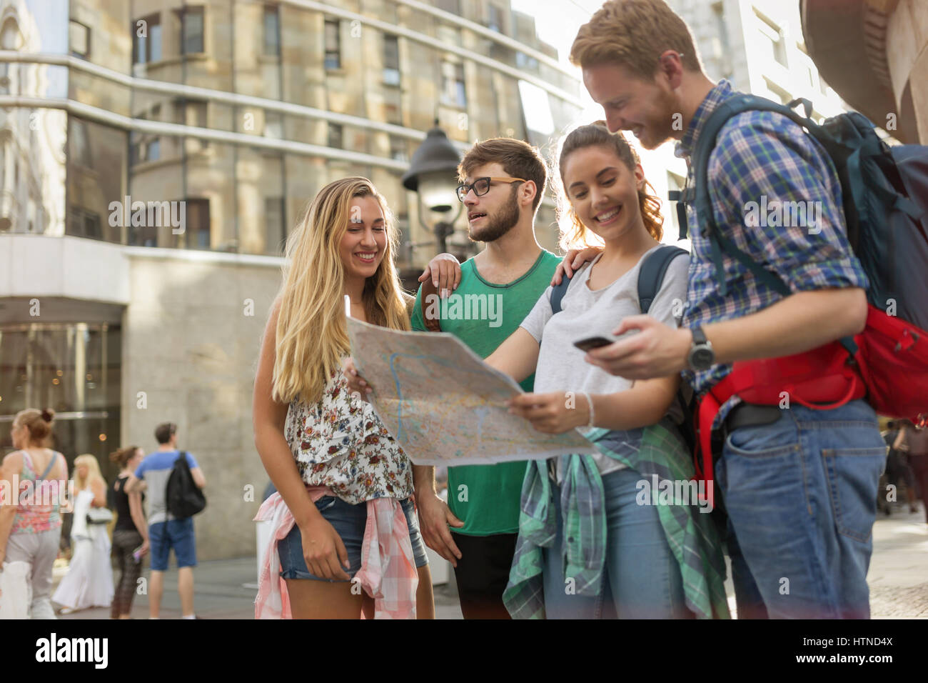 Happy young students on a travelling adventure Stock Photo - Alamy