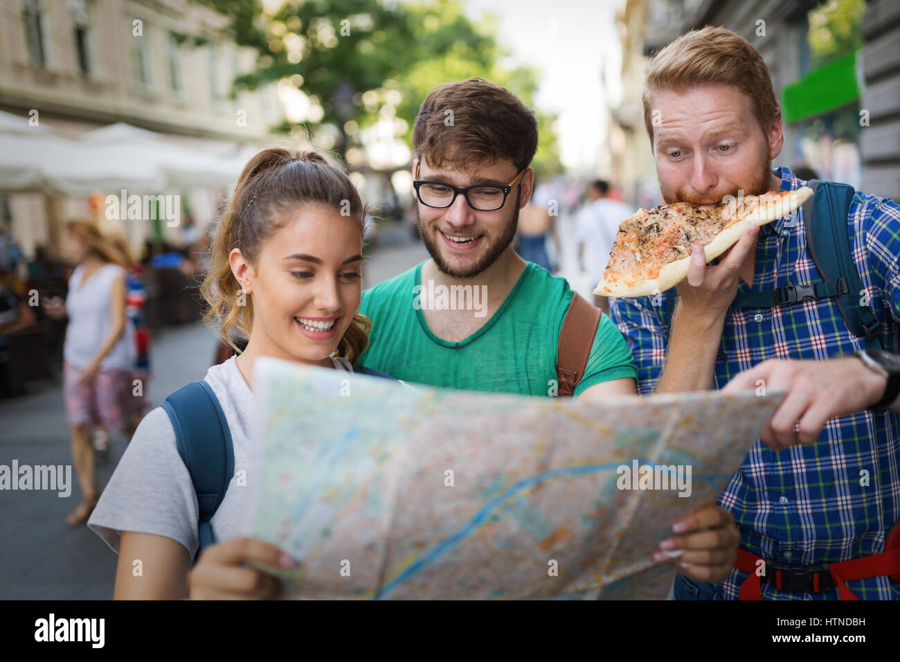 Happy group of tourists traveling and sightseeing together Stock Photo ...