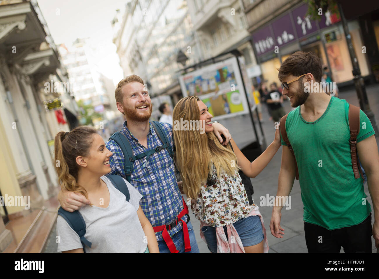 Happy young people having fun outdoors and smiling Stock Photo - Alamy